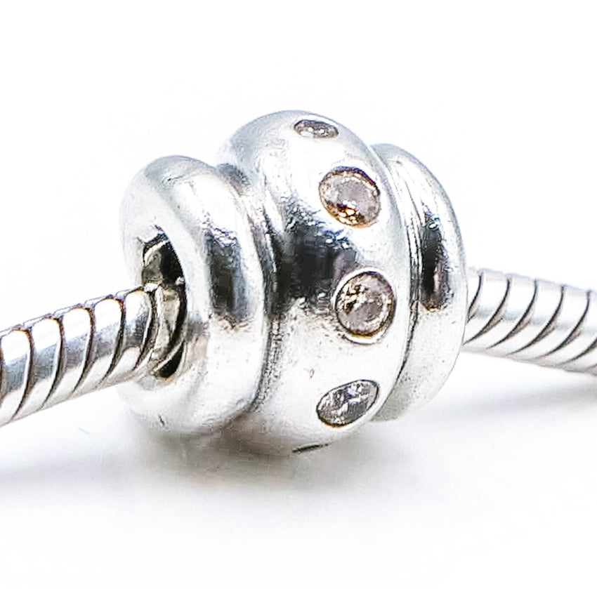 PANDORA Champagne Swirl Sterling Silver Charm With Champagne Zirconia ...